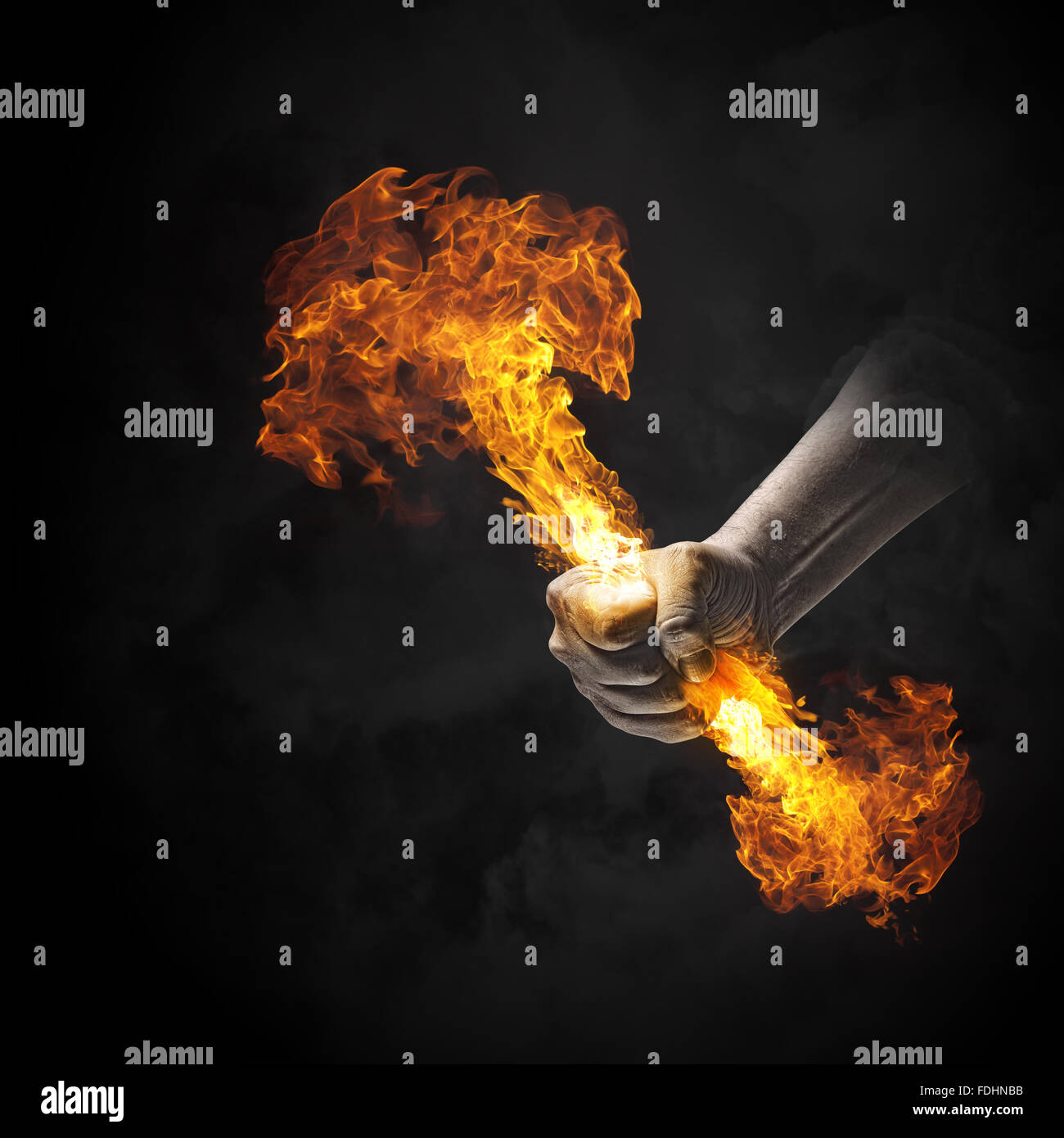 Close up of human hand holding fire flame Stock Photo - Alamy