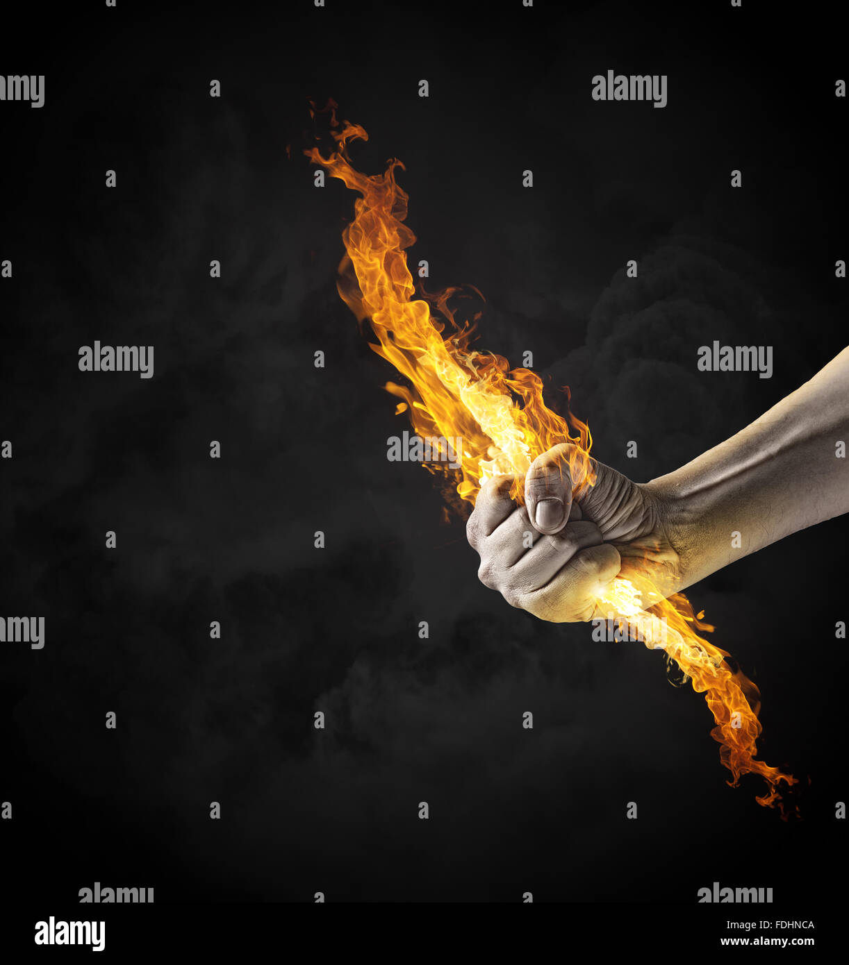 Close up of human hand holding fire flame Stock Photo - Alamy