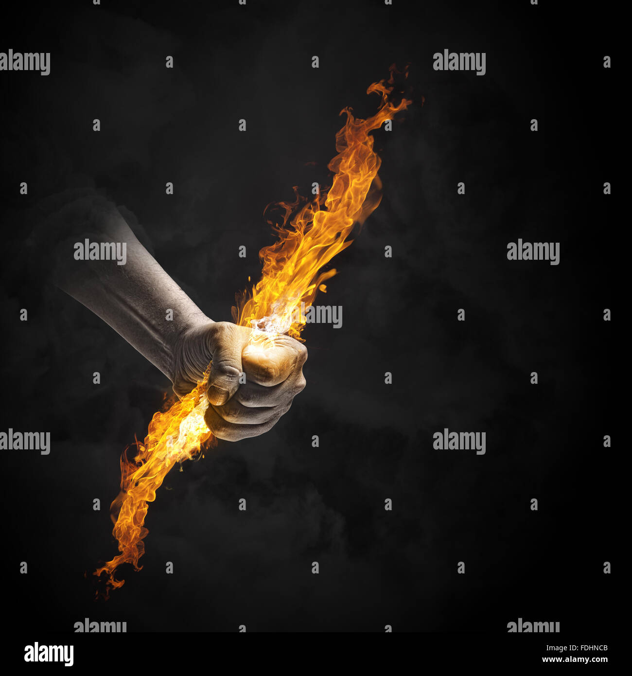 Close up of human hand holding fire flame Stock Photo - Alamy
