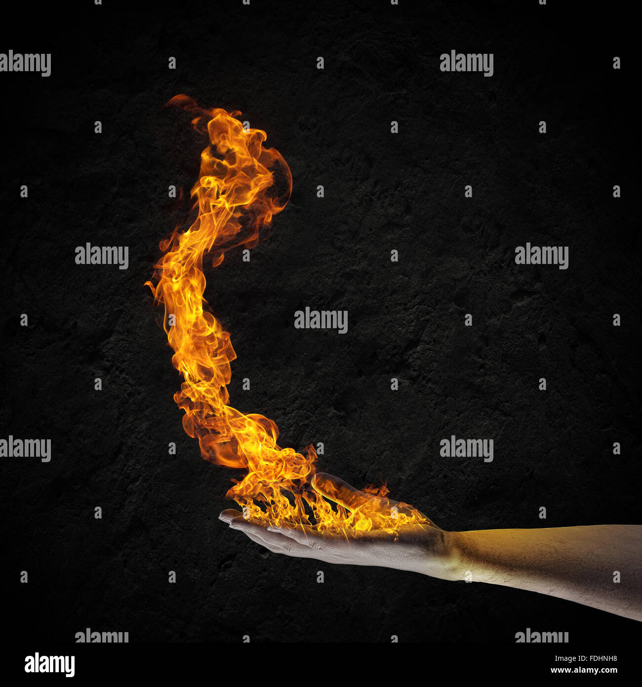 Close up of human hand holding fire flame Stock Photo - Alamy