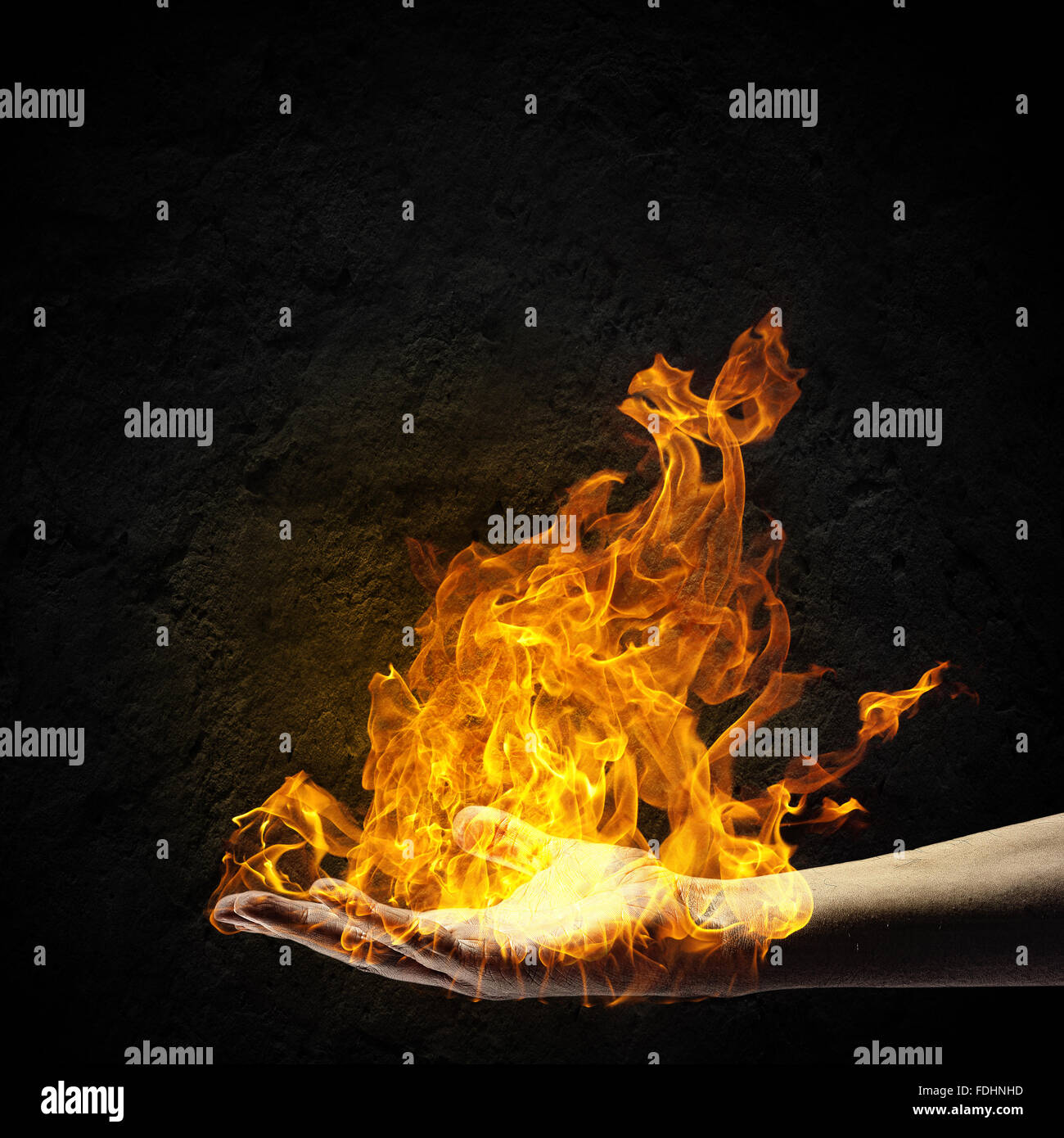 Close up of human hand holding fire flame Stock Photo - Alamy