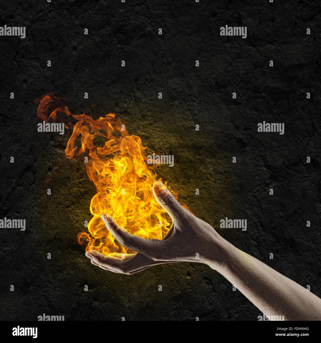 Close up of human hand holding fire flame Stock Photo - Alamy