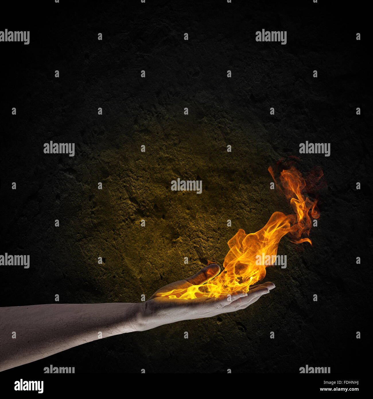 Close up of human hand holding fire flame Stock Photo - Alamy