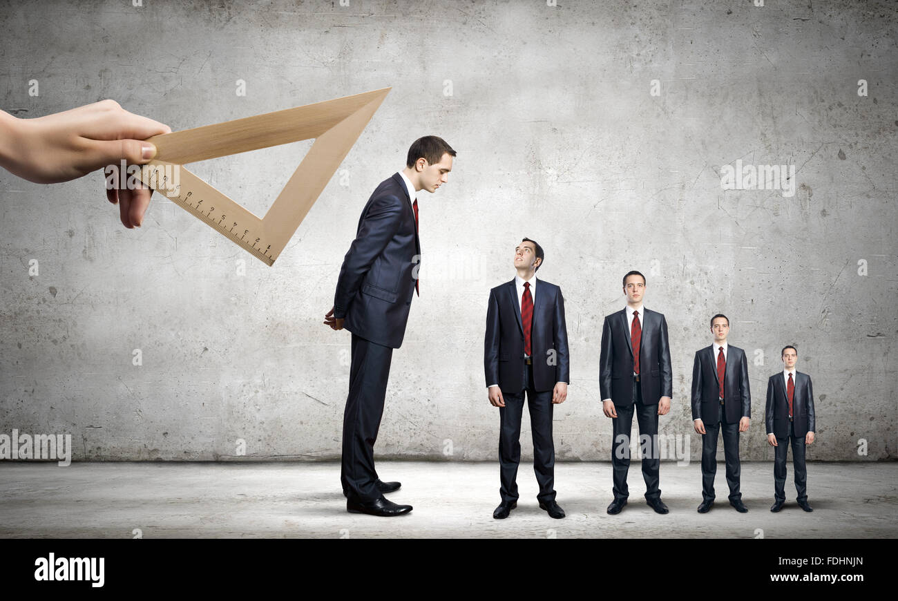 Successful confident businessmen standing in line. Progress in career ...