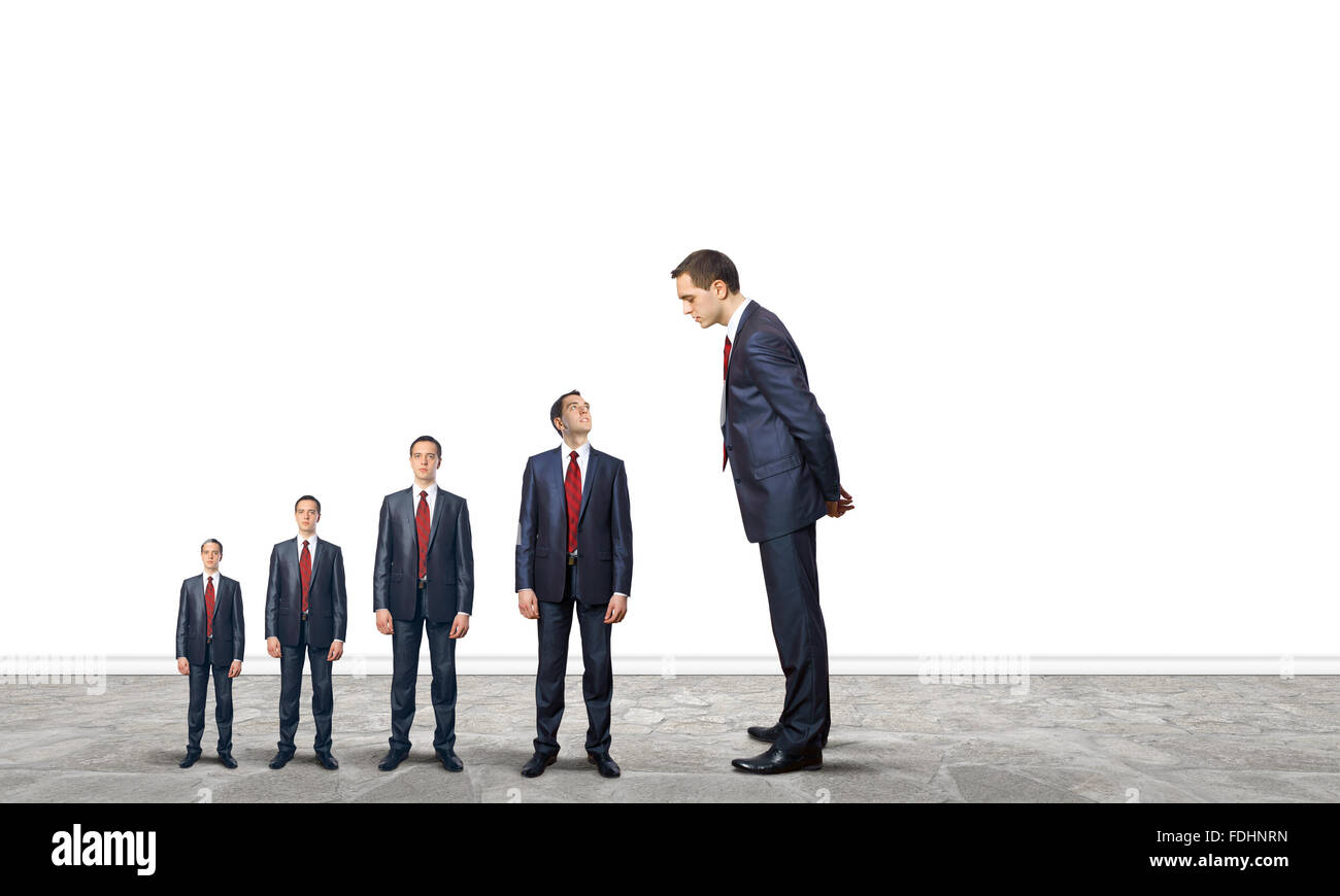 Successful confident businessmen standing in line. Progress in career ...