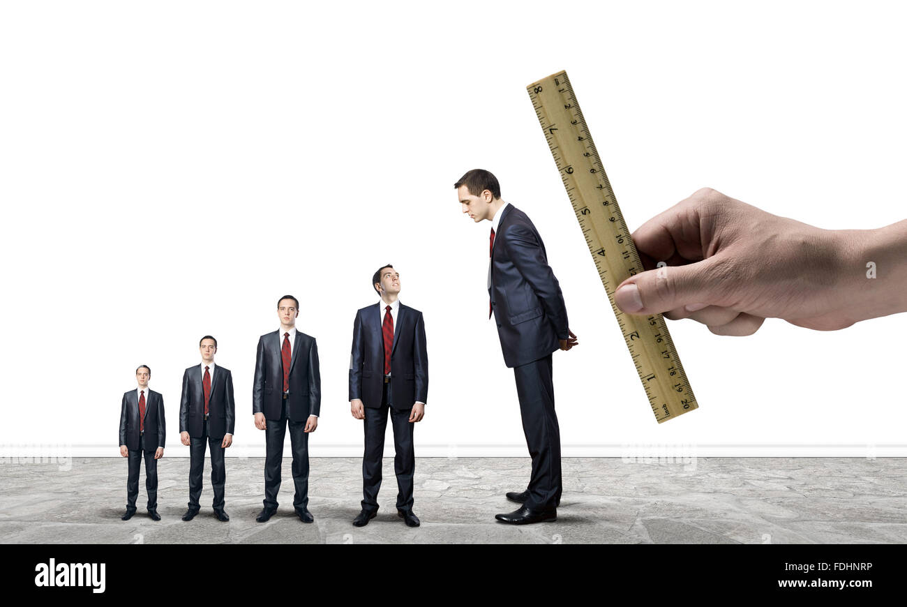 Successful confident businessmen standing in line. Progress in career ...
