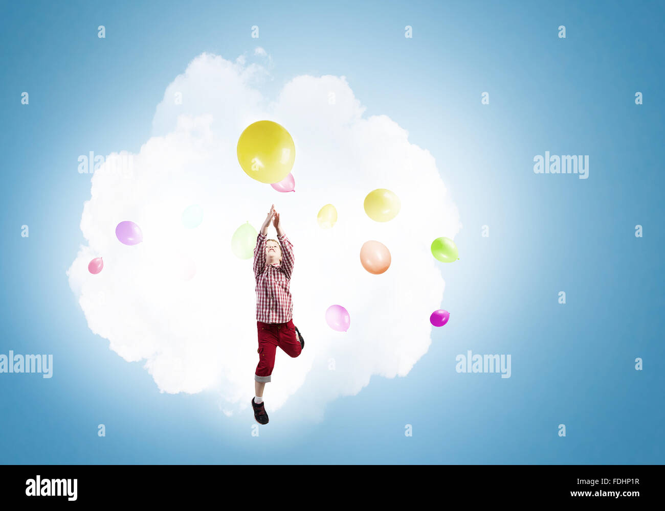 Little happy cute boy flying on balloon Stock Photo - Alamy