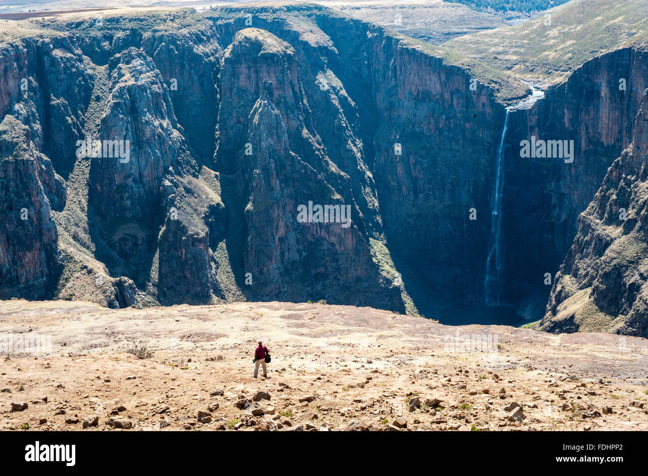 Person standing waterfall hi-res stock photography and images - Alamy