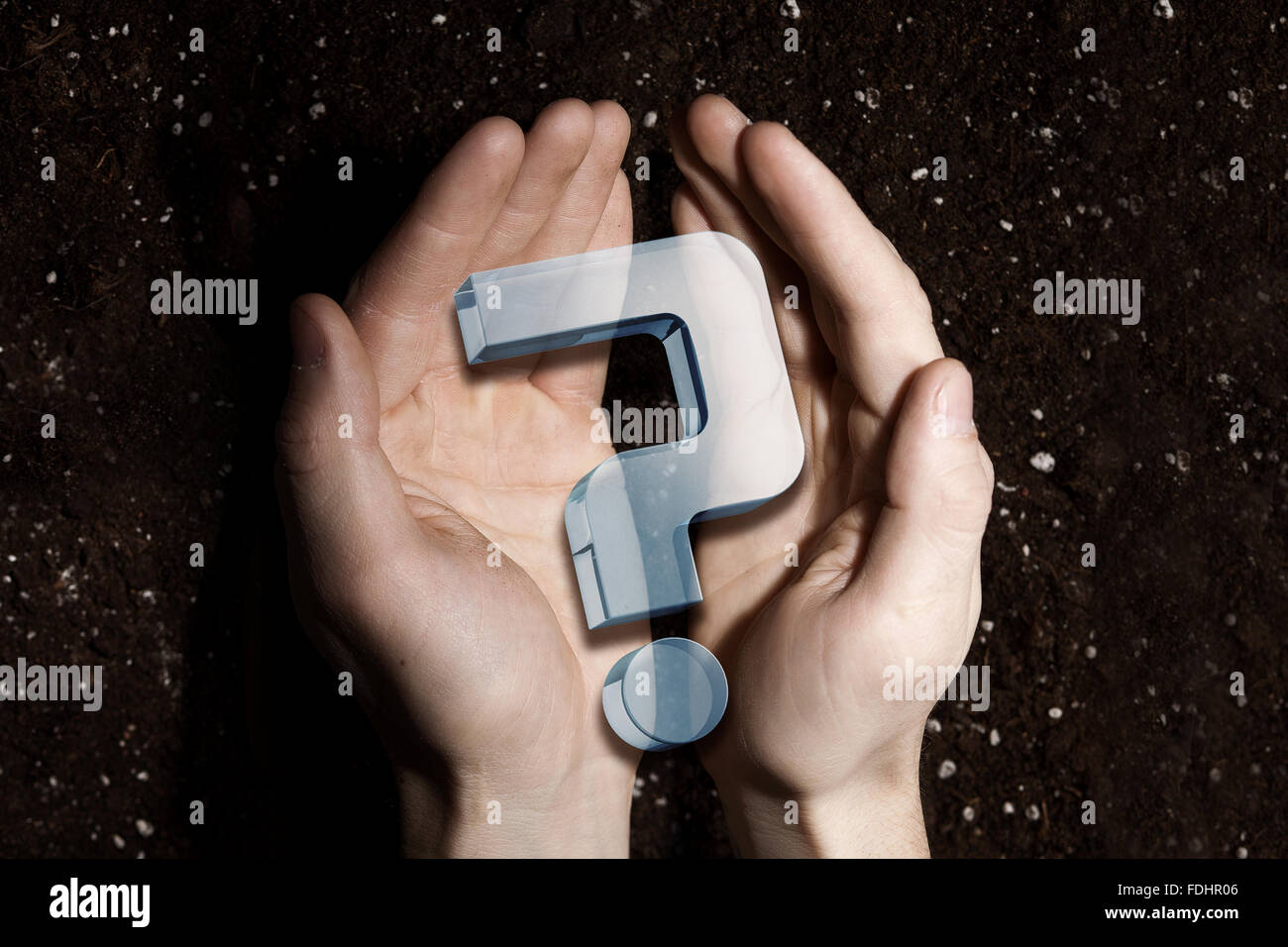 Human hands holding question mark on soil concept background Stock ...