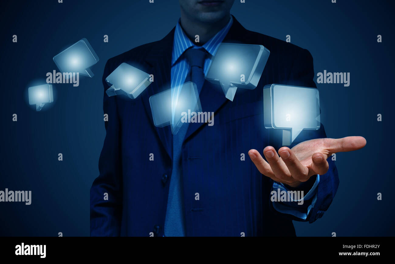 Businessman holding message icon hi-res stock photography and images ...