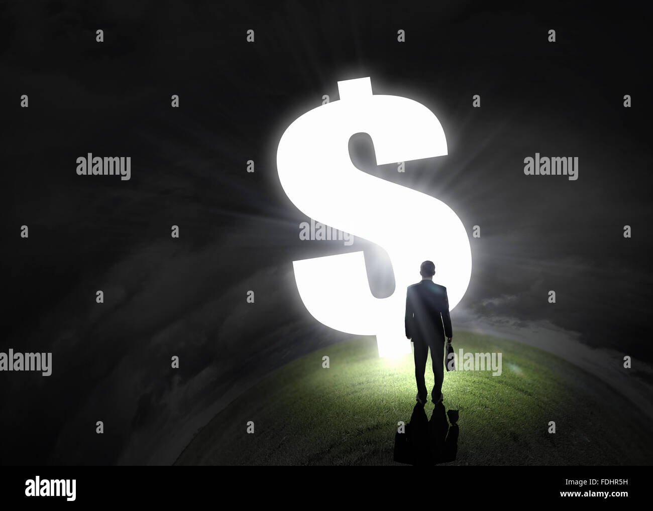Silhouette of businessman and big dollar currency symbol Stock Photo ...