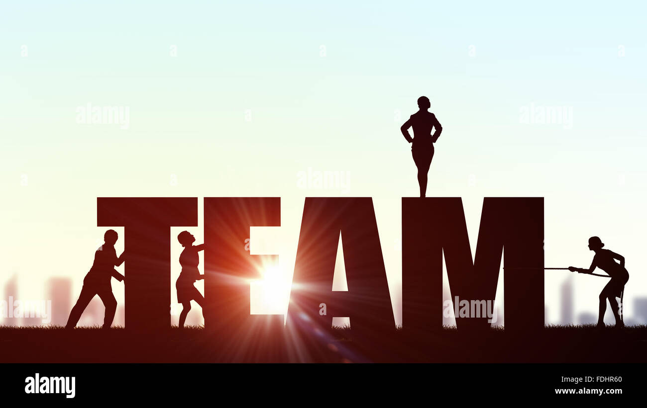 Business people pulling word team representing collaboration concept ...