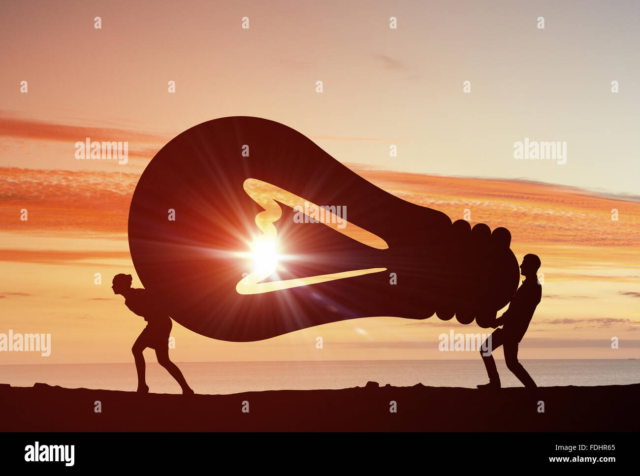 Business people carrying light bulb representing collaboration concept ...