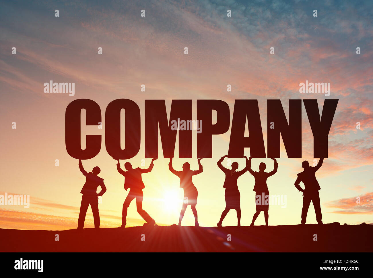 Business people lifting word company representing collaboration concept ...