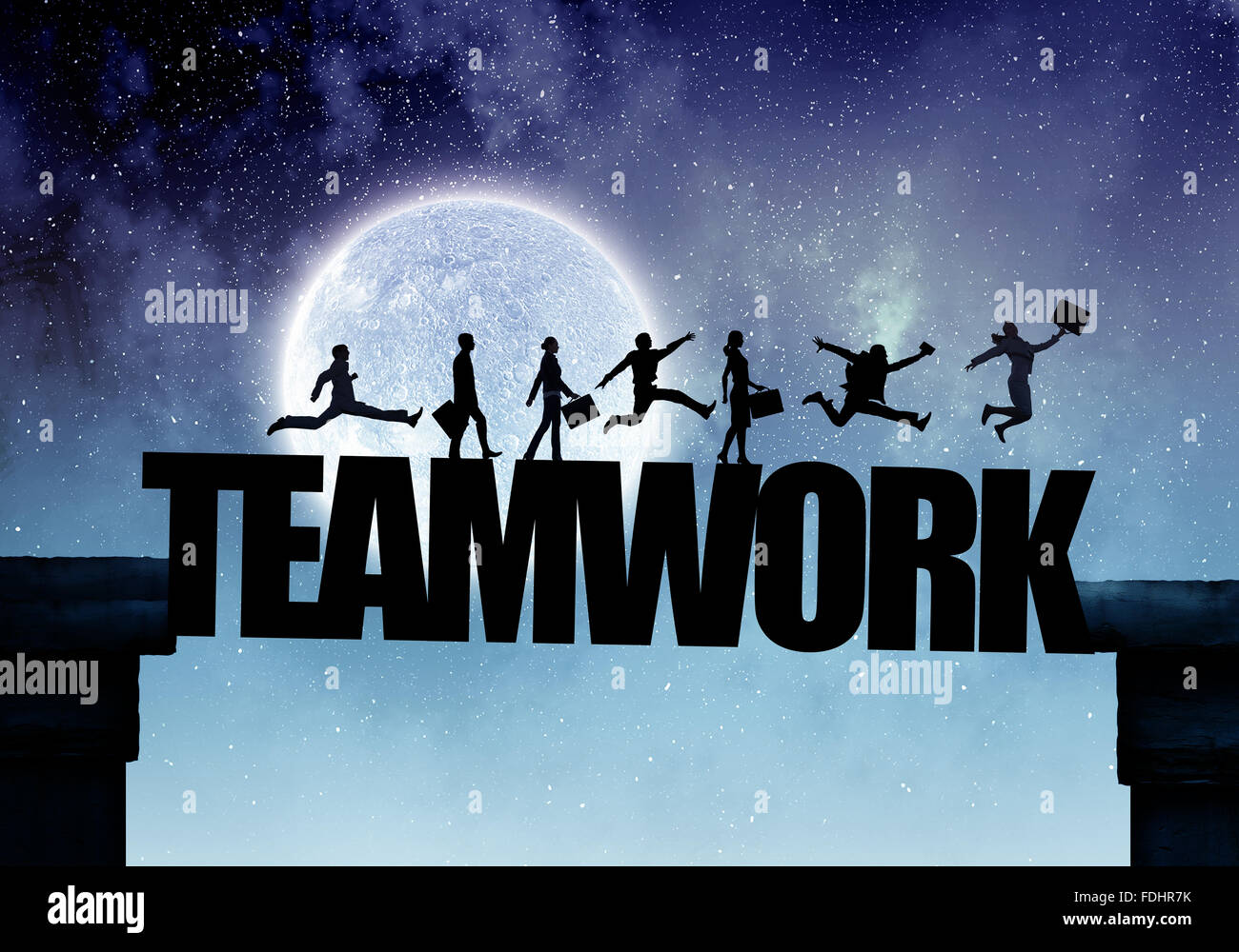 Team of business people running on teamwork word bridge over precipice ...