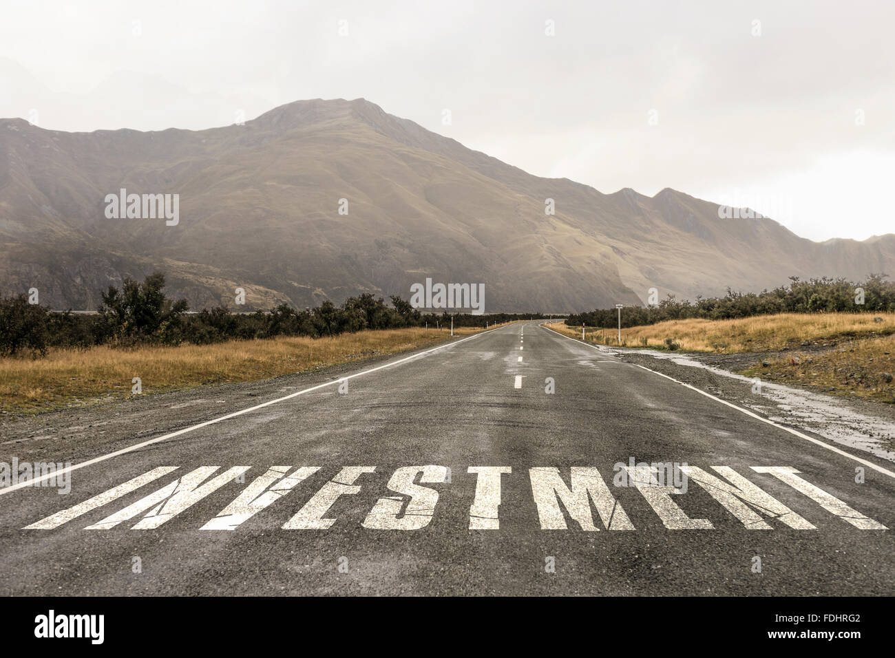 Asphalt road with business conceptual word drawn with white paint Stock ...