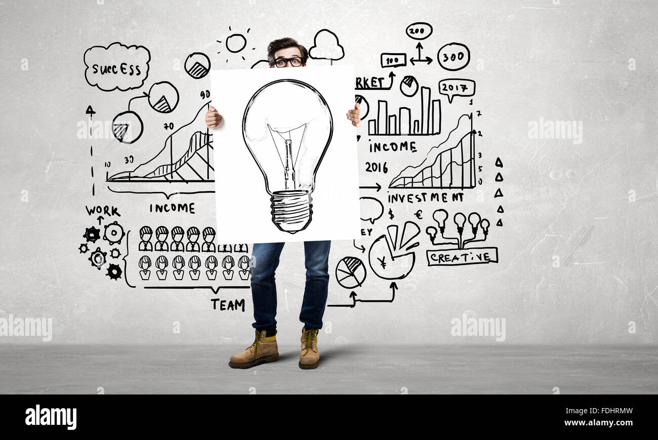 Man from behind holding sign hi-res stock photography and images - Alamy