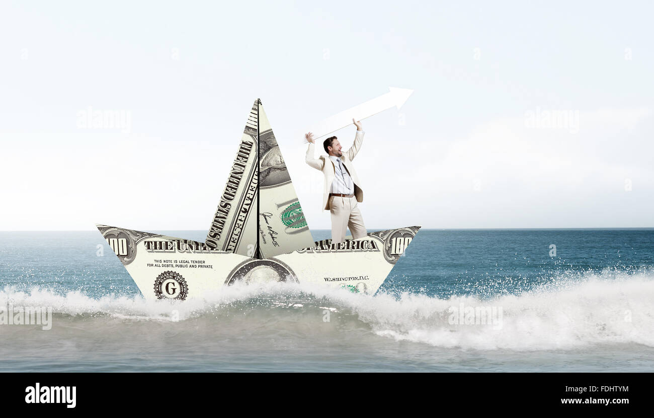 Successful businessman sailing on dollar boat in financial sea Stock ...