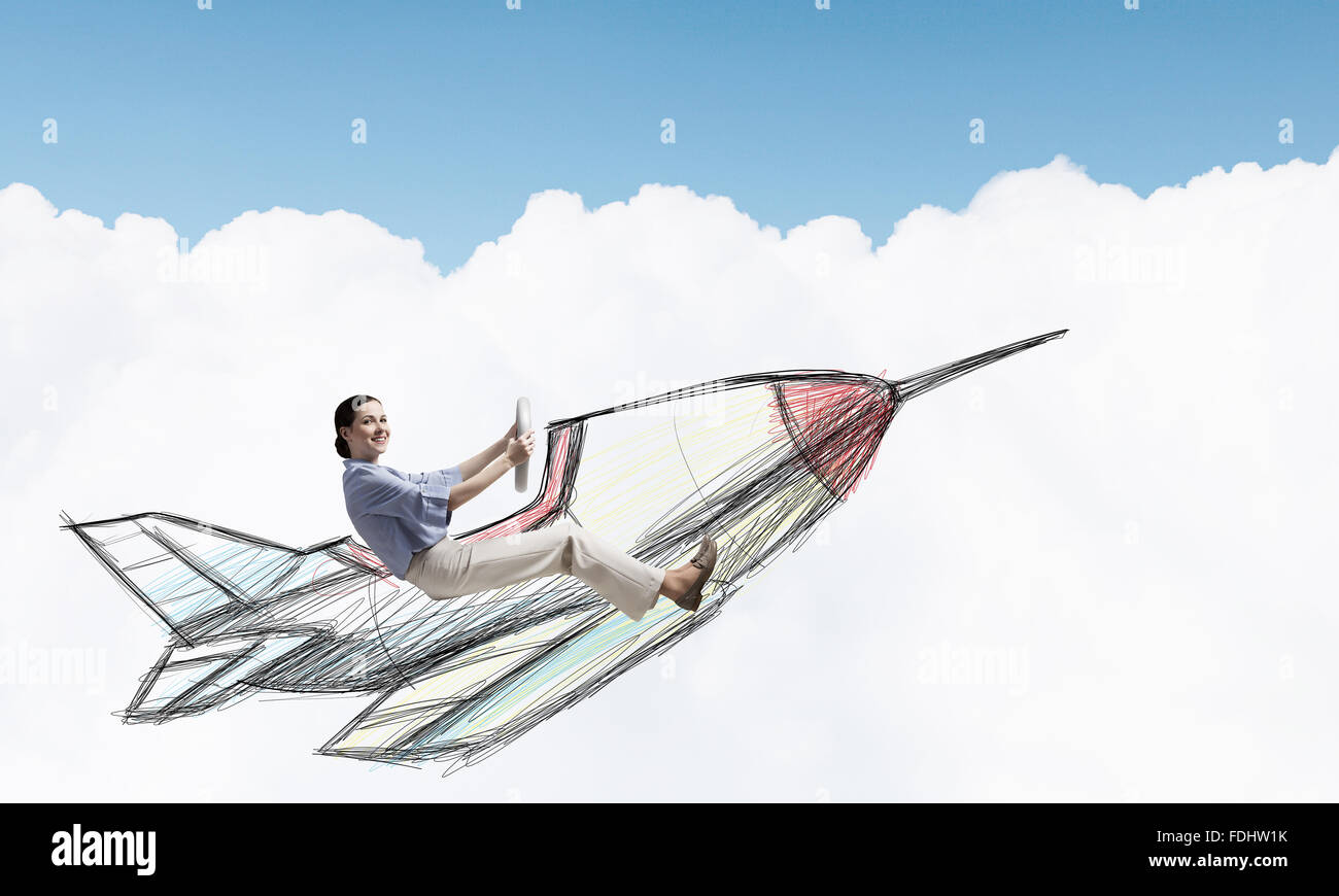 Young funny woman flying in air in drawn airplane Stock Photo - Alamy