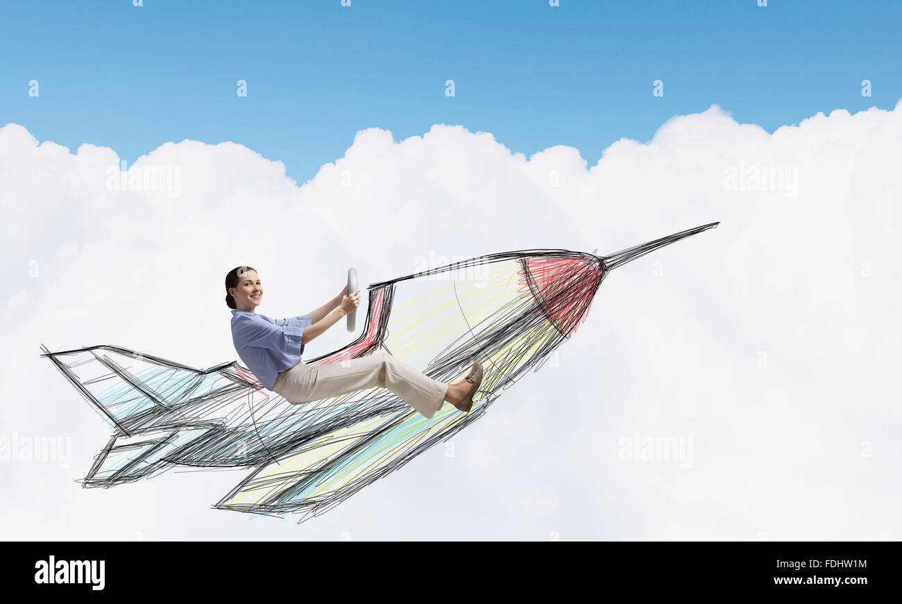 Young funny woman flying in air in drawn airplane Stock Photo - Alamy