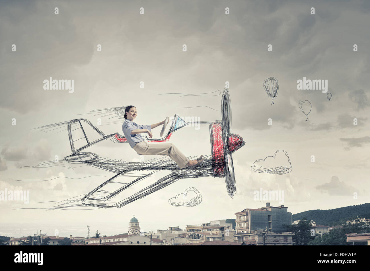 Young funny woman flying in air in drawn airplane Stock Photo - Alamy