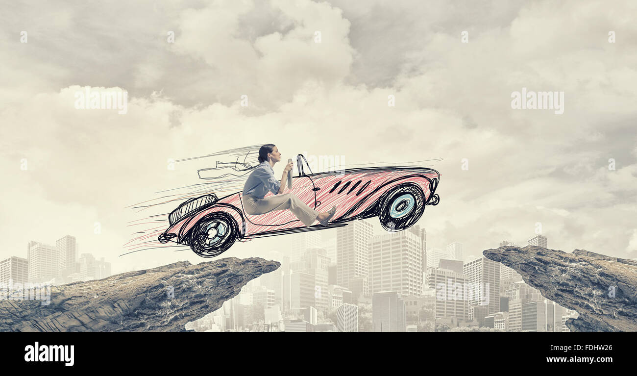 Young humorous woman driving drawn funny car Stock Photo - Alamy