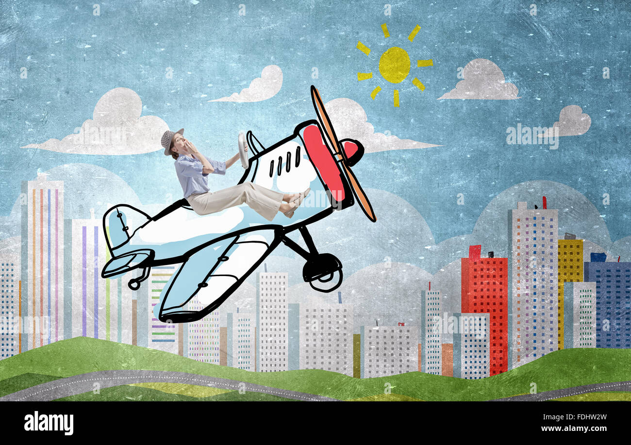 Young funny woman flying in air in drawn airplane Stock Photo - Alamy