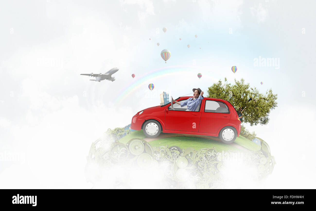 Young humorous woman driving drawn funny car Stock Photo - Alamy