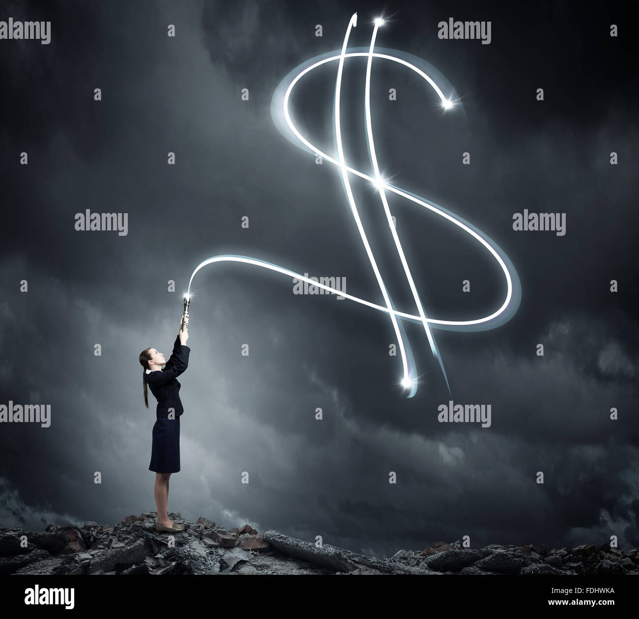 Businesswoman in darkness drawing dollar sign with flashlight Stock ...