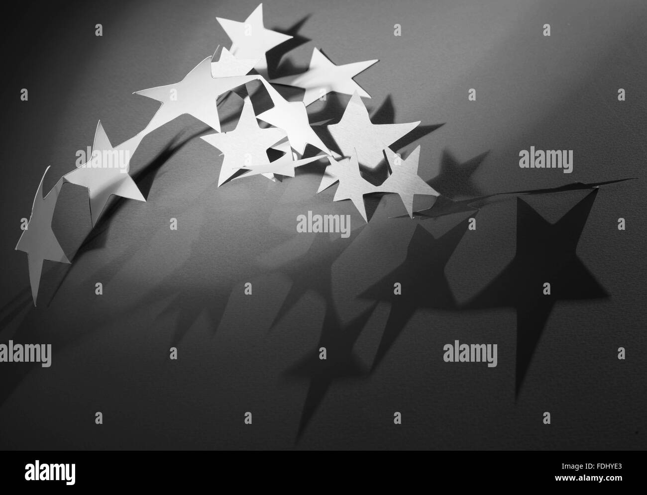 Paper stars group on a colour background Stock Photo - Alamy