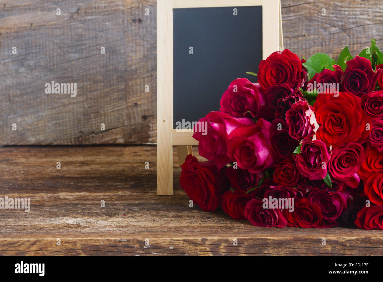 Pile red roses hi-res stock photography and images - Alamy