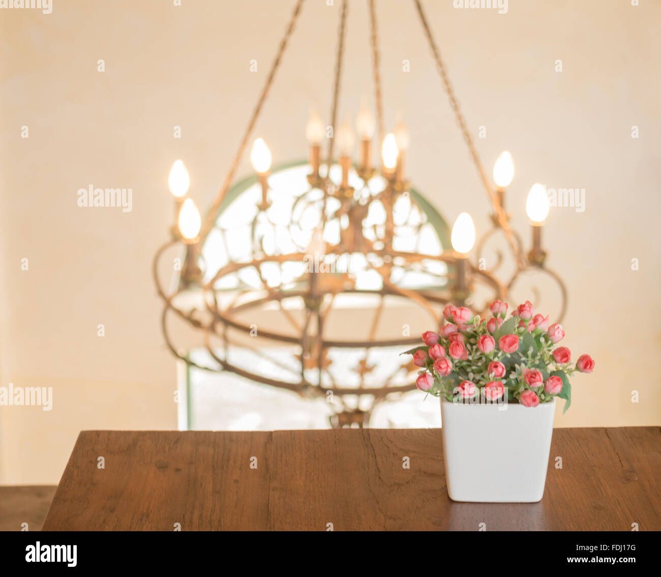 Wooden table decorated with flower bouquet, stock photo Stock Photo - Alamy