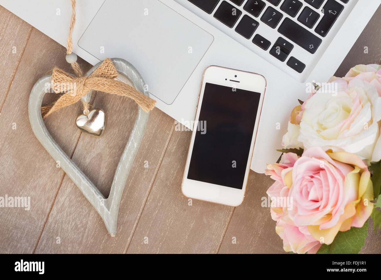 styled desktop with modern phone Stock Photo - Alamy