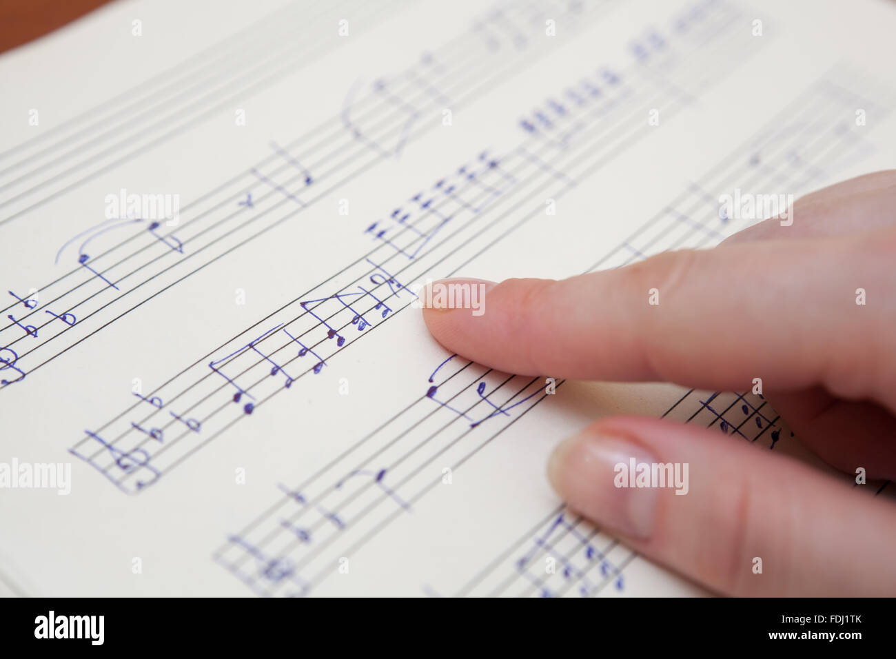 Music book with handwritten notes Stock Photo - Alamy