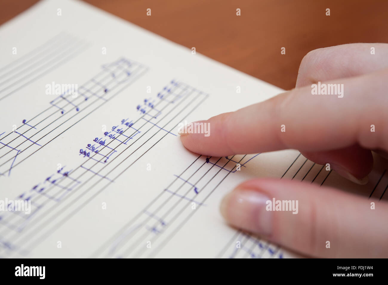 Music book with handwritten notes Stock Photo - Alamy