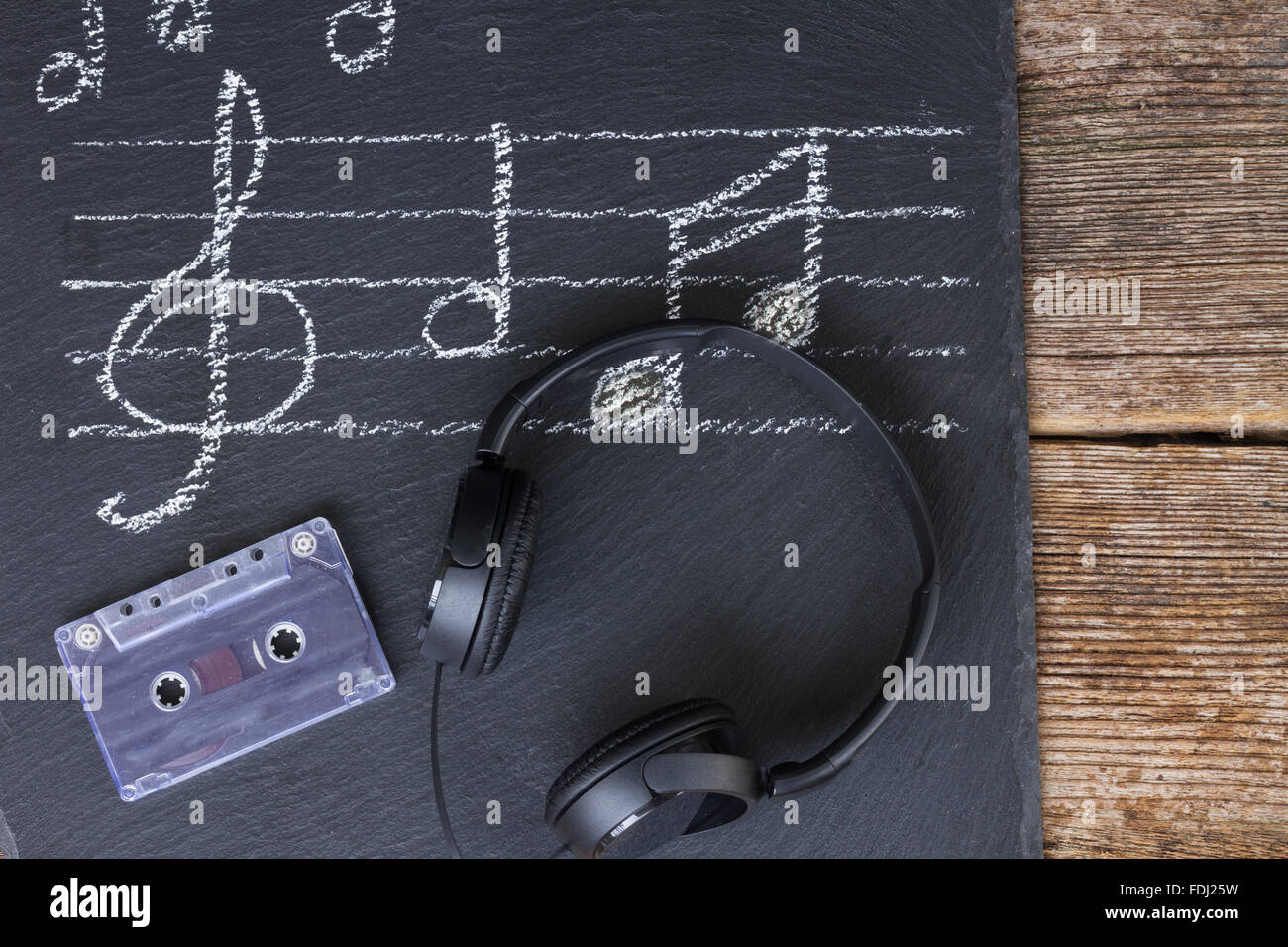 Music notes with headphones Stock Photo - Alamy