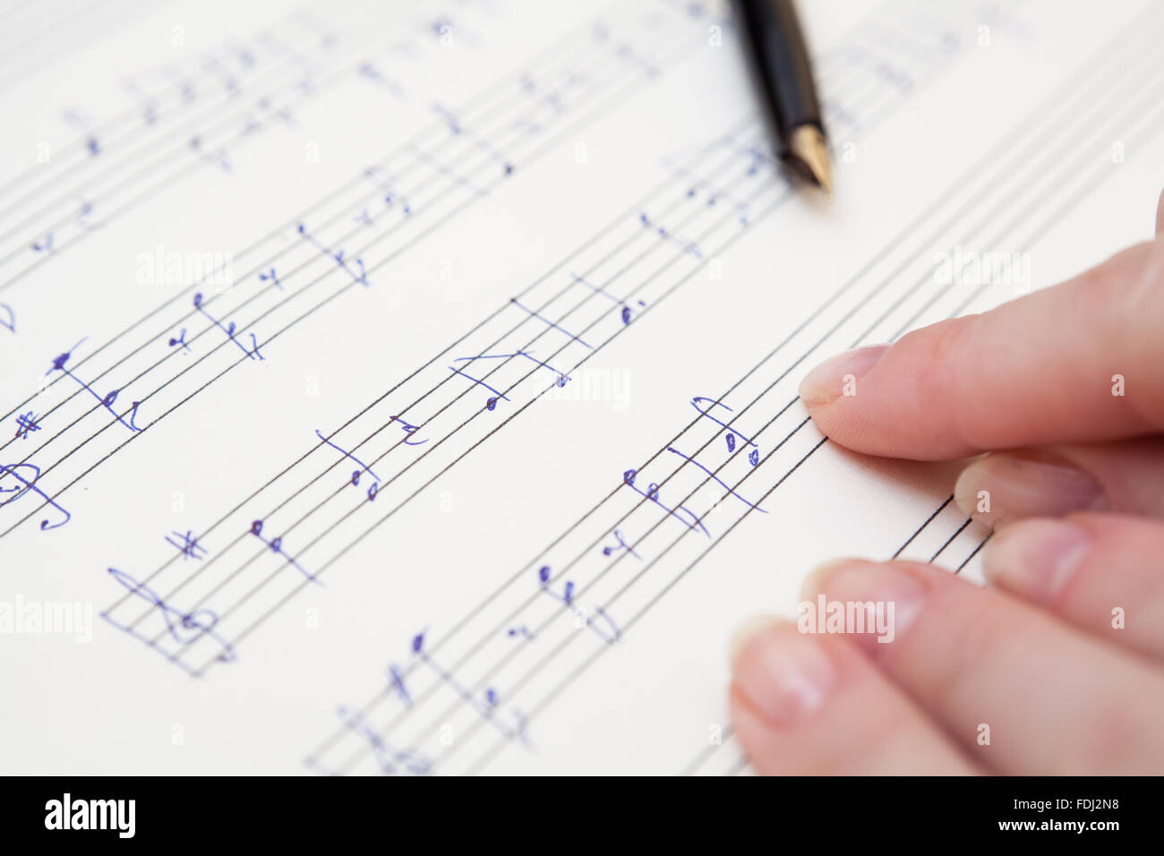 Music book with handwritten notes Stock Photo - Alamy