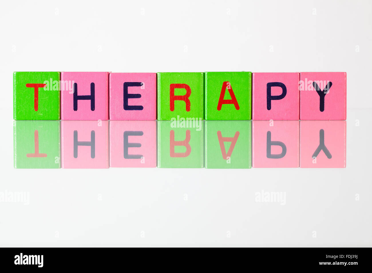 Therapy - an inscription from children's wooden blocks Stock Photo - Alamy
