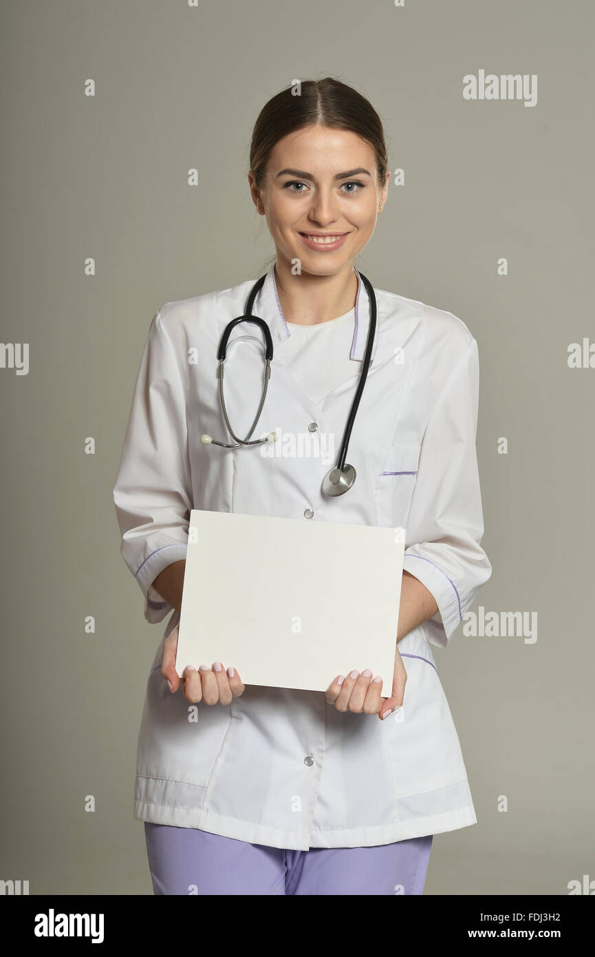 doctor with white list Stock Photo - Alamy