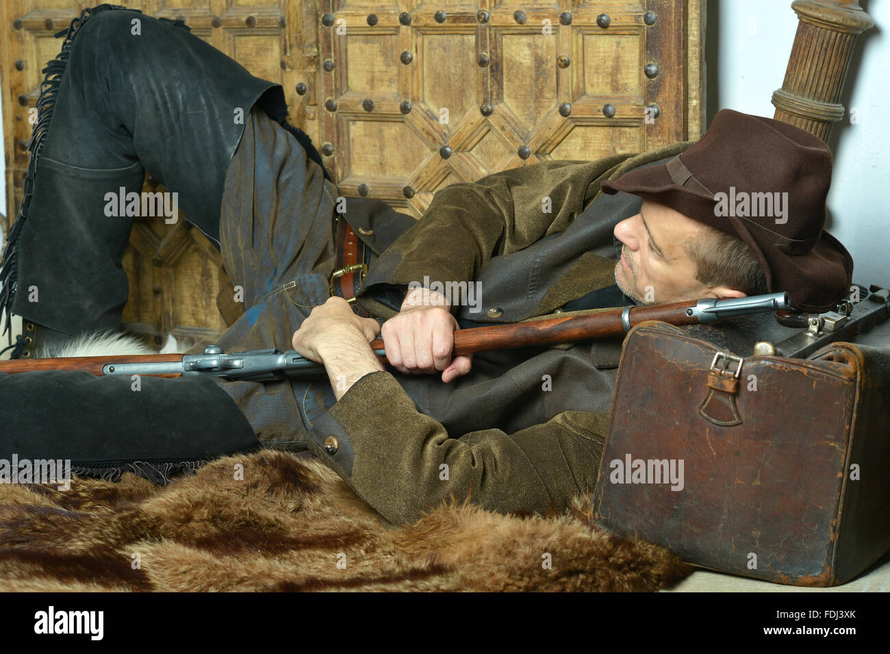 Bandit with gun Stock Photo - Alamy