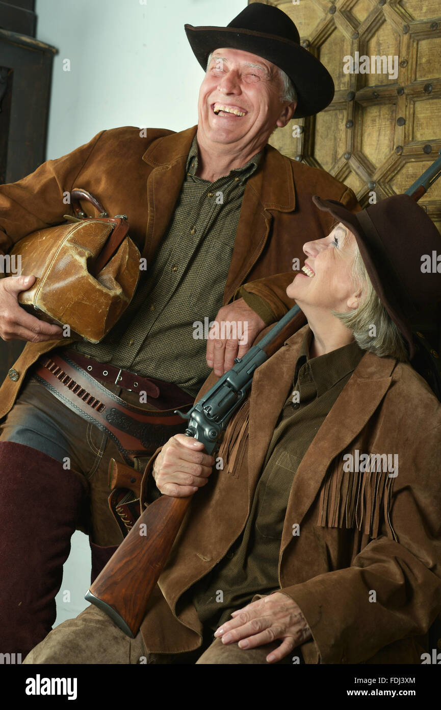 Two smiling hunters Stock Photo - Alamy