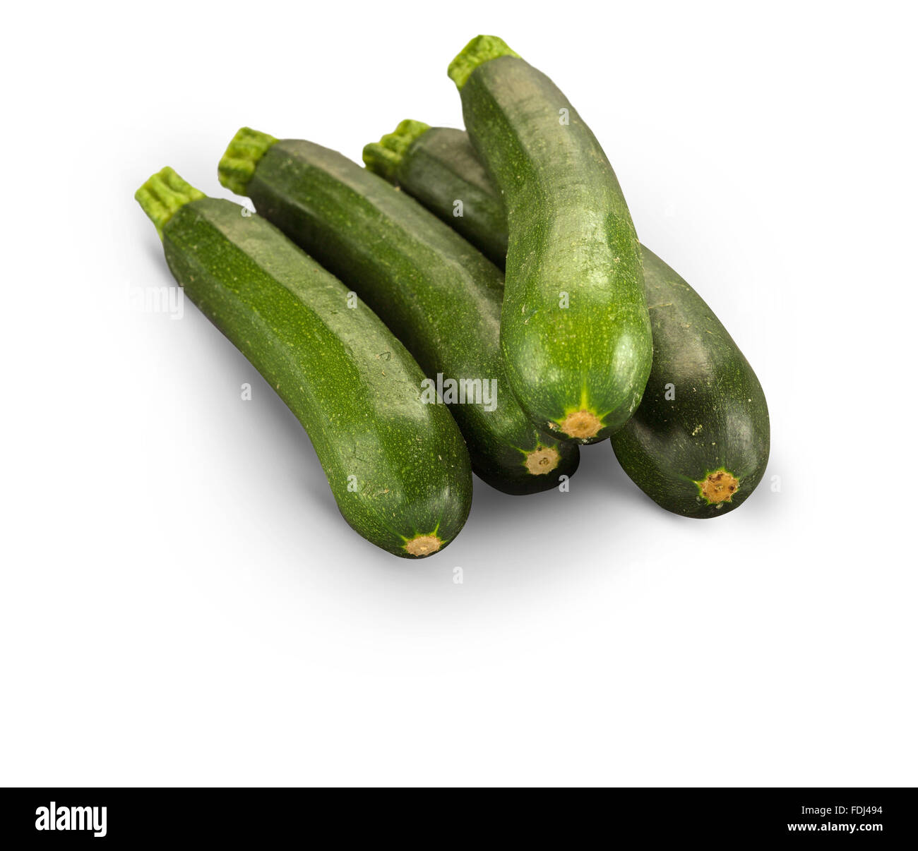 Organic Courgettes isolated on white background Stock Photo - Alamy