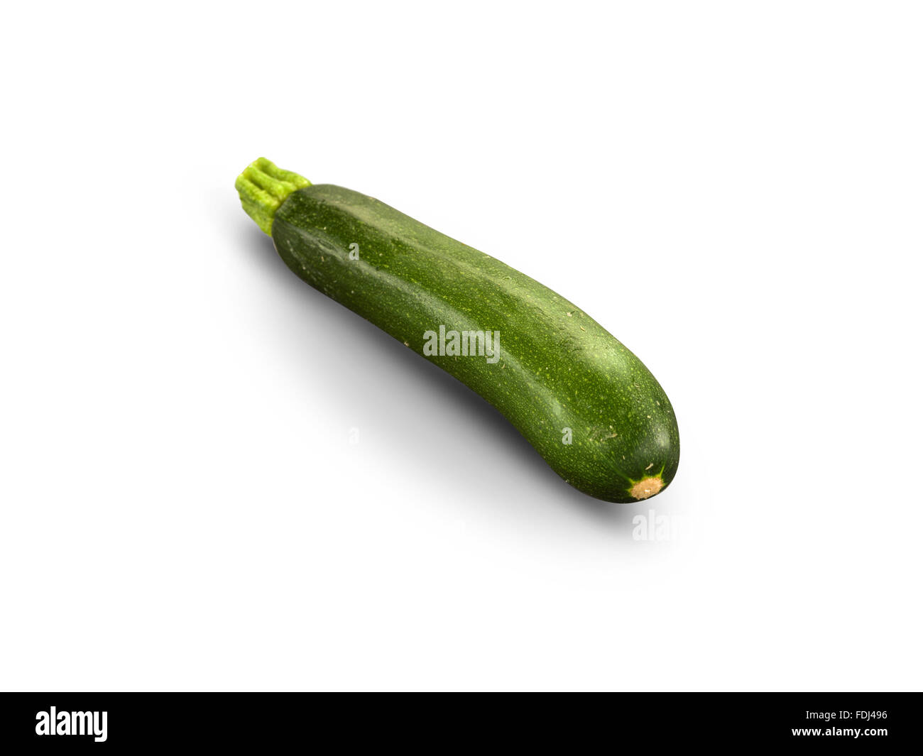 Organic Courgettes isolated on white background Stock Photo - Alamy