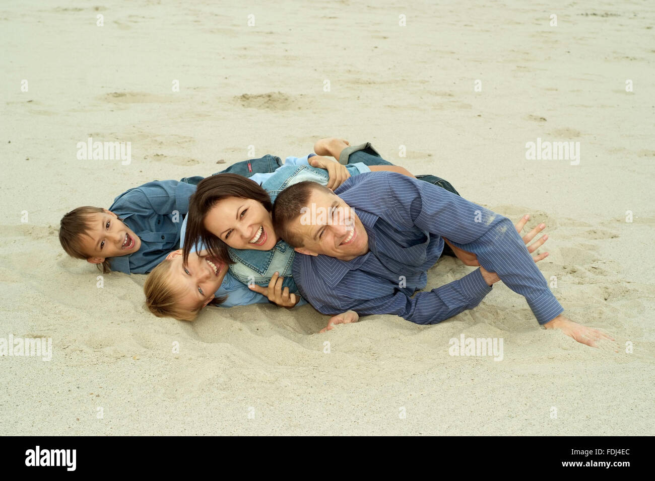 funny family of four Stock Photo - Alamy