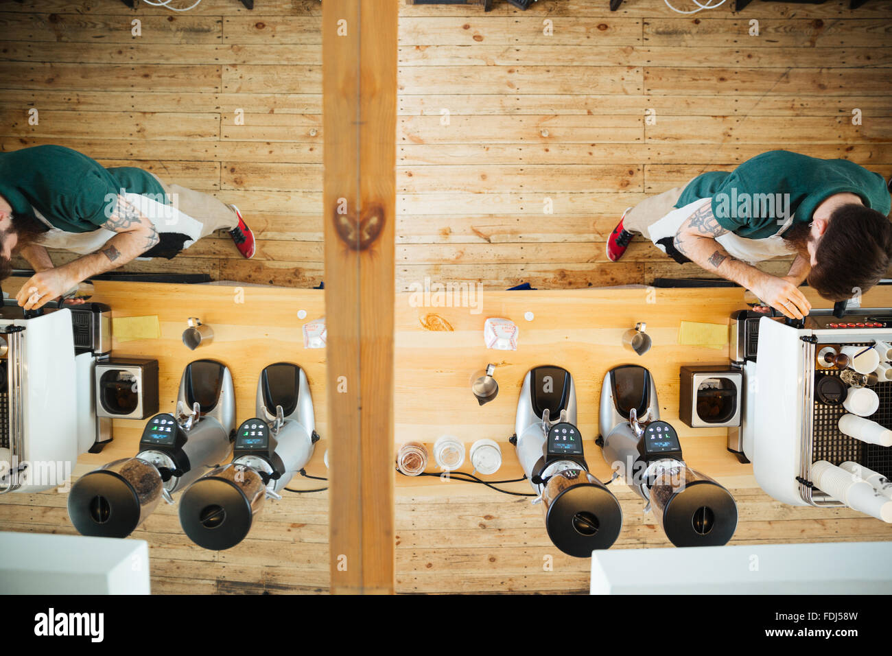 Top view portrait of barista preparing coffee in coffee shop Stock ...