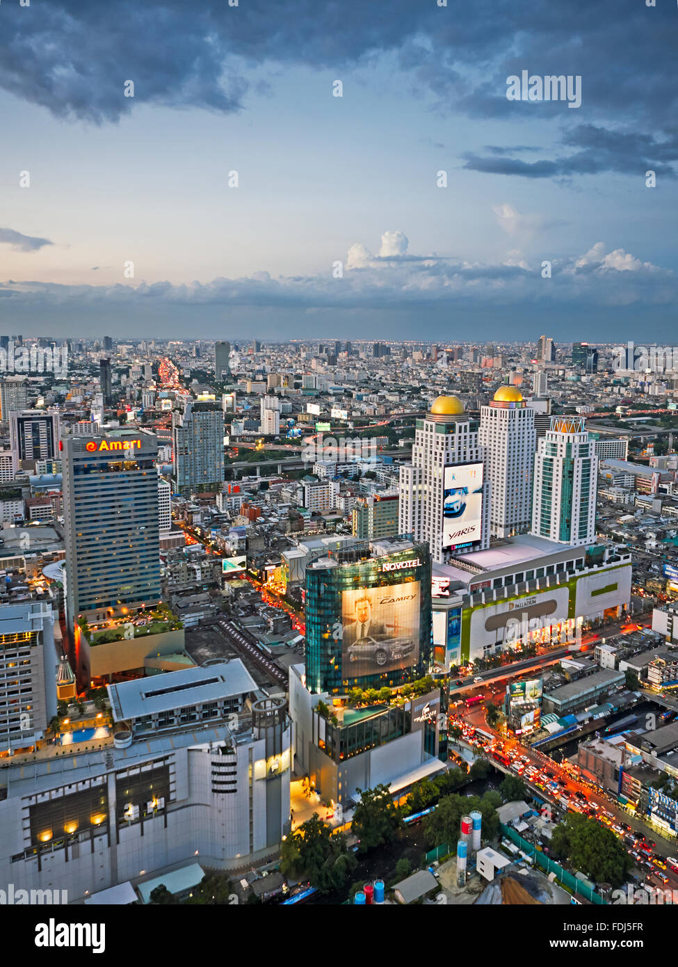 Elevated view of high-rise buildings in Pathum Wan District at dusk ...