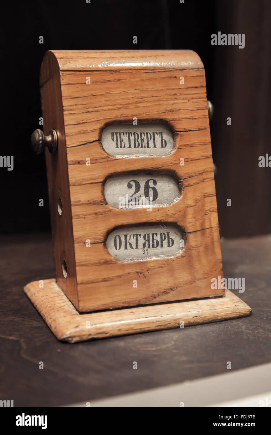 Ancient manual wooden calendar shows the date of October 26, Thursday ...