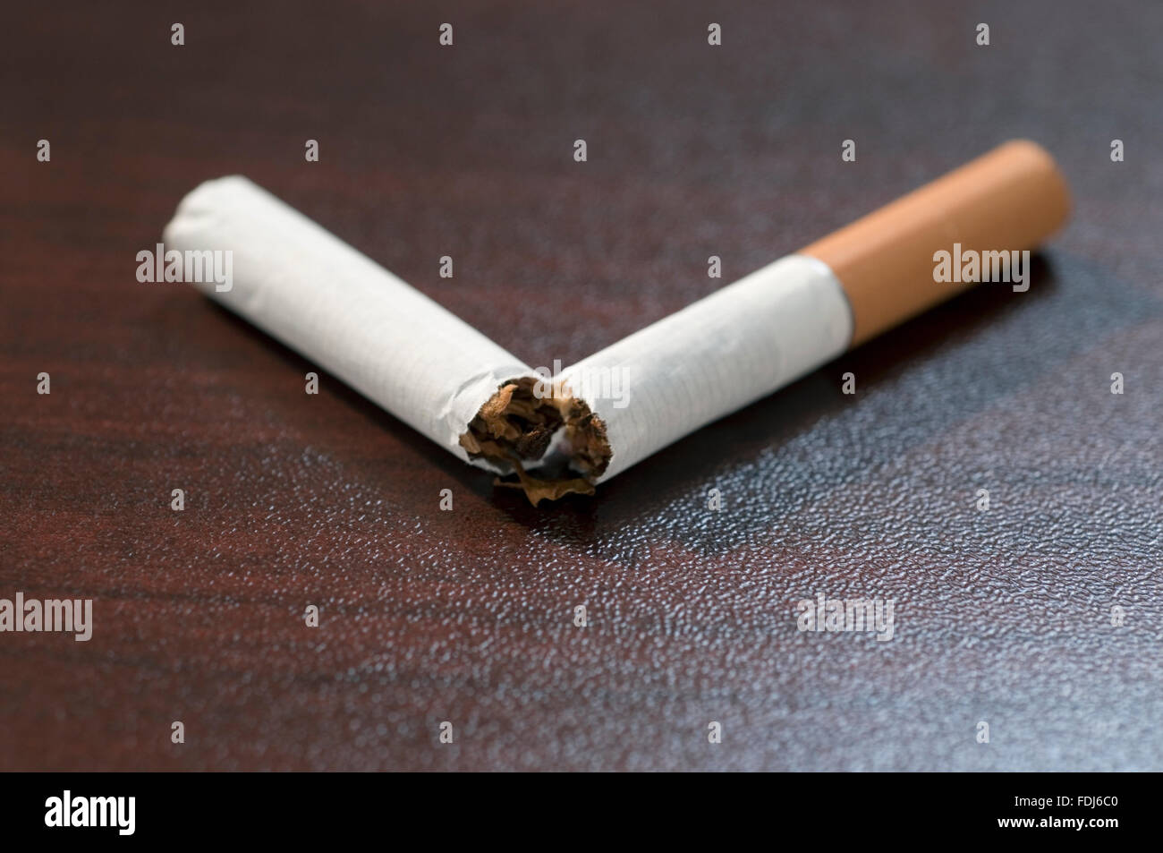 Broken cigarette hi-res stock photography and images - Alamy