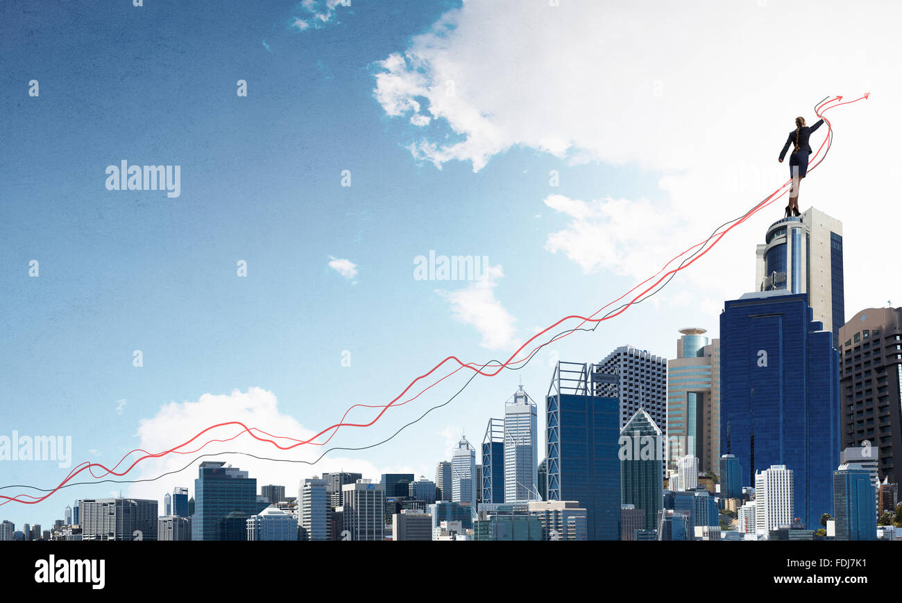 Young businesswoman catch with hand growing graph arrow Stock Photo - Alamy