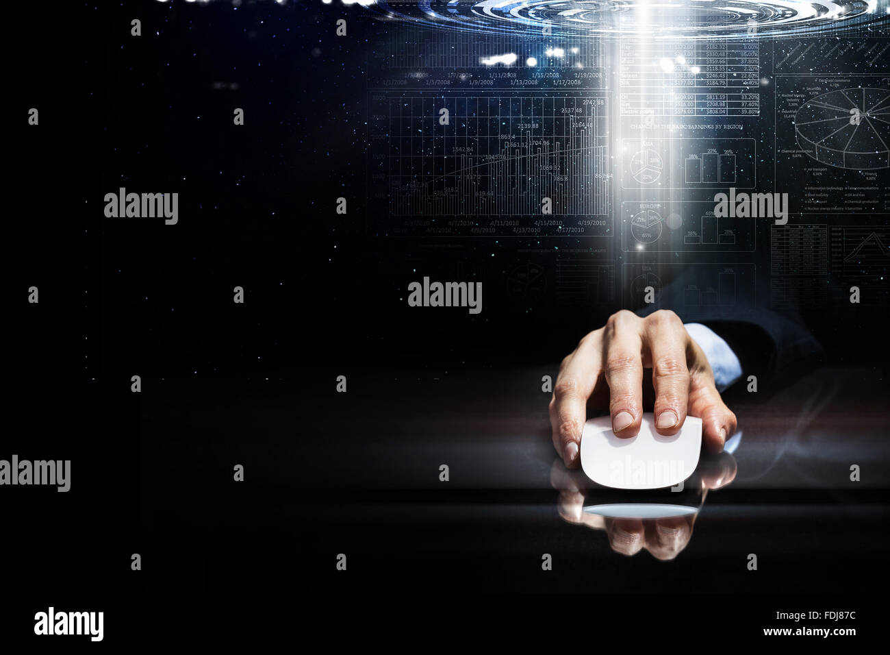 Hand of businessman in suit on dark digital background using wireless ...